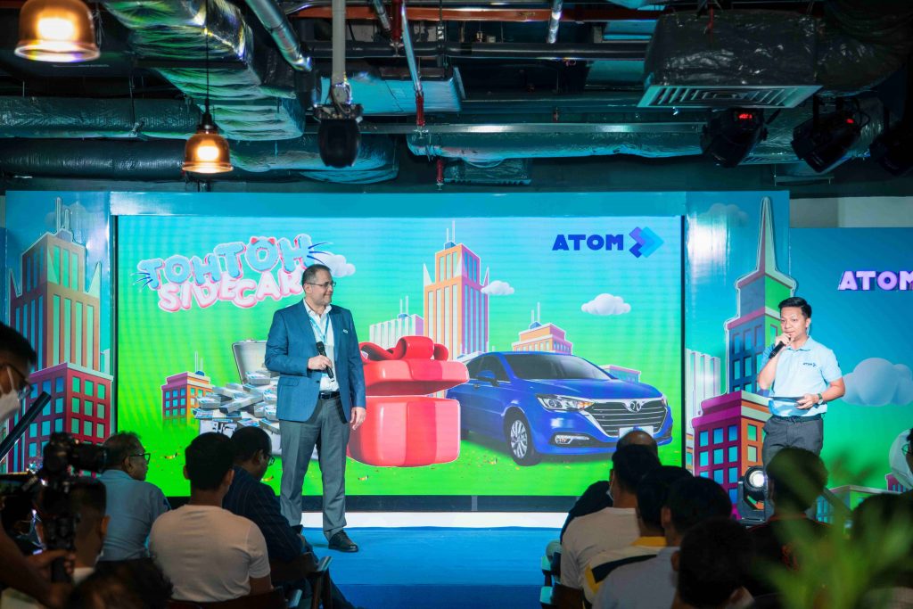 အက်တမ် (ATOM) မှ လူအများကြိုက်နှစ်သက်သည့် တို့တို့ဆိုက်ကား 3D ဂိမ်း ၏ Mega Draw အနိုင်ရရှိသူမ ...